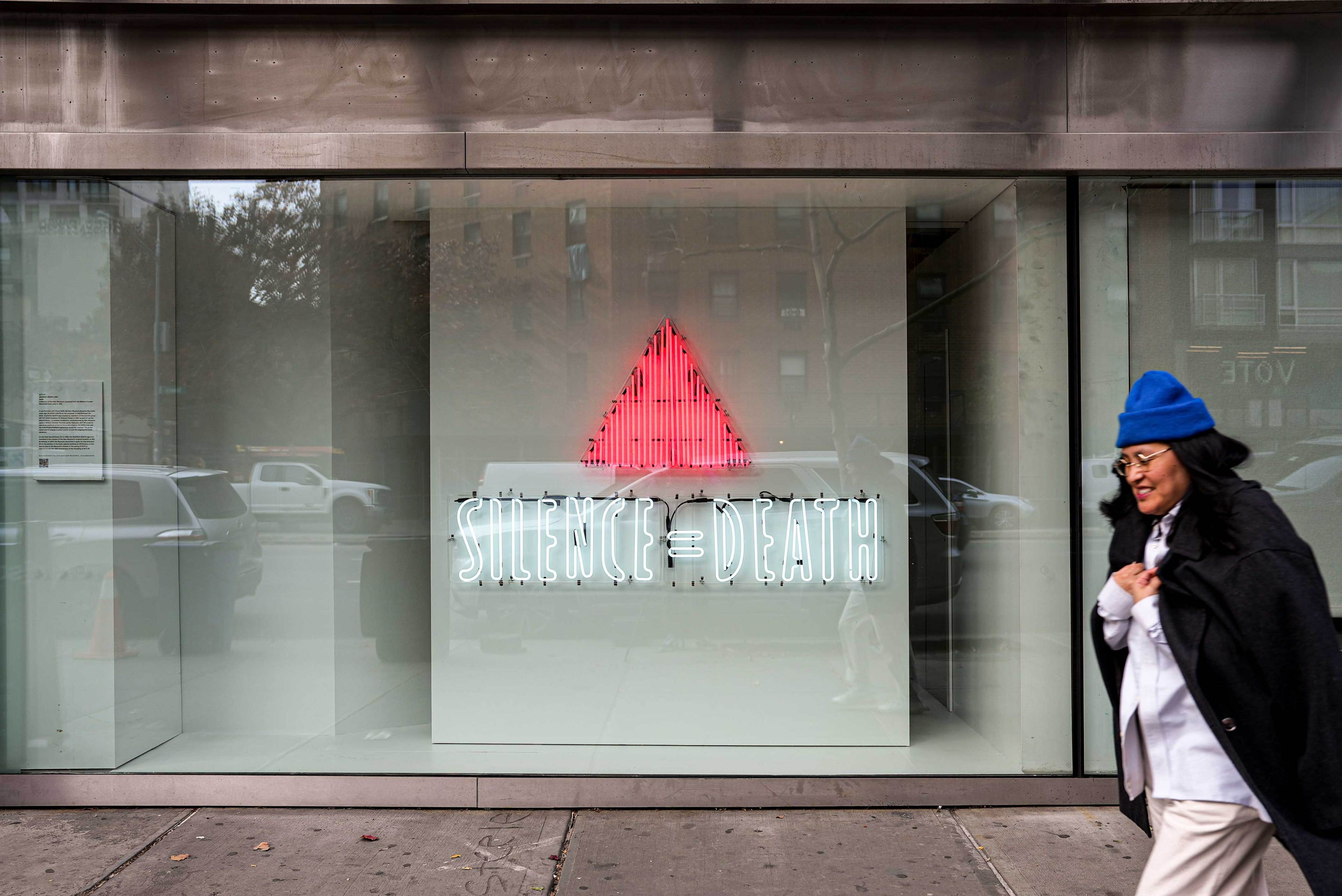 Street view of a 2024 window installation of SILENCE=DEATH.